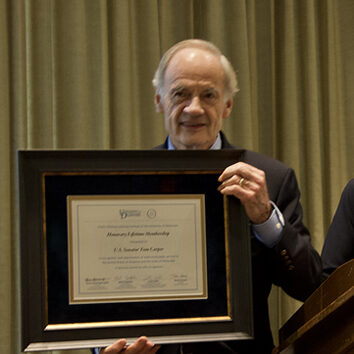 OLLI presents Sen. Tom Carper with lifetime membership - Osher Lifelong ...